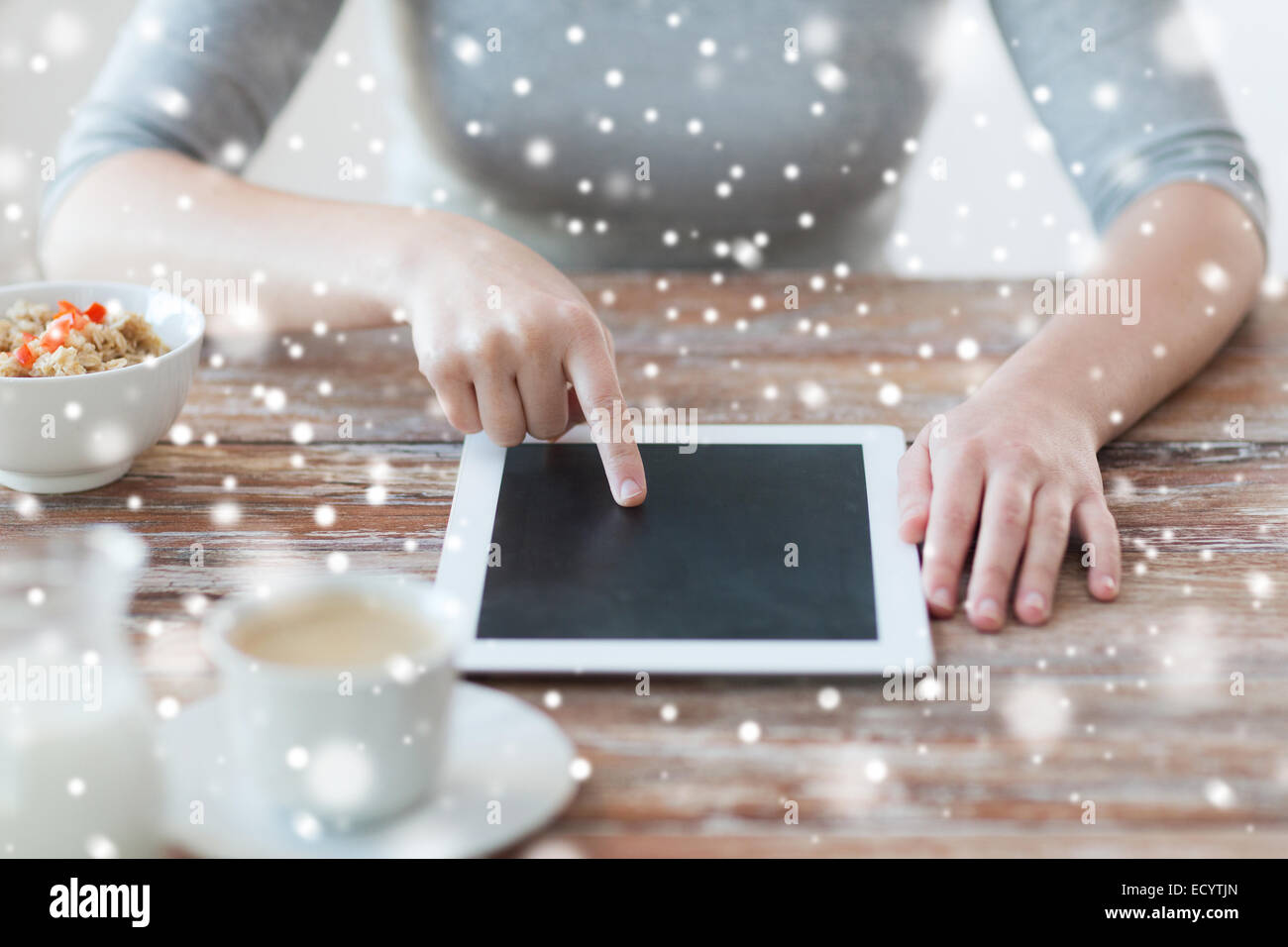 woman pointing finger to tablet pc computer Stock Photo - Alamy
