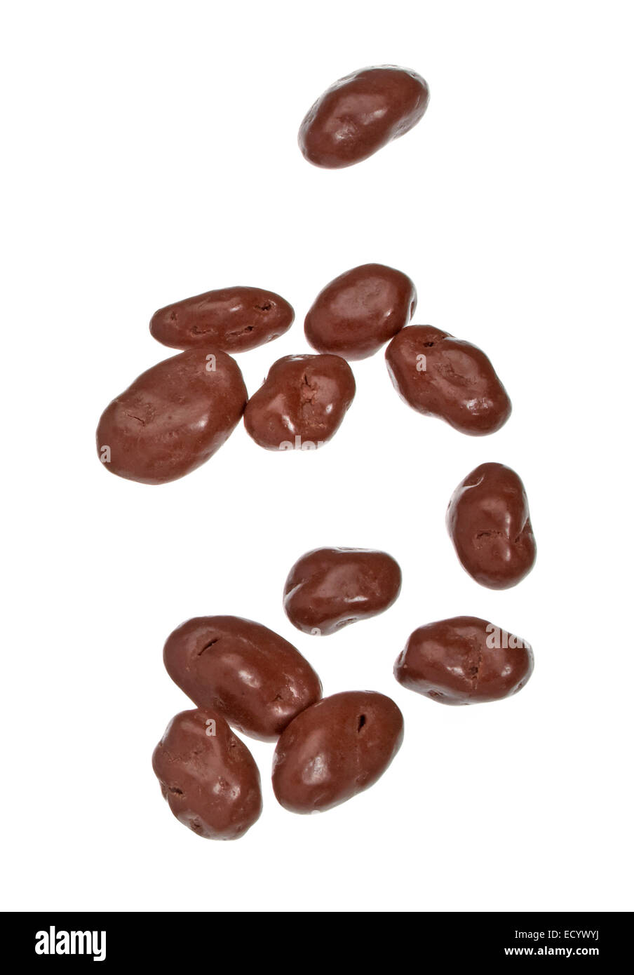 a few loose Raisinets on a white background Stock Photo - Alamy