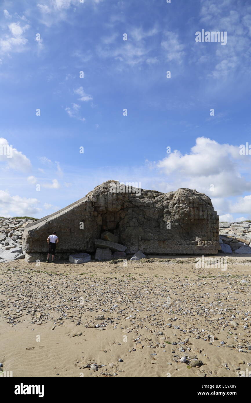 Damaged Atlantic wall bunkers and defences in Normandy, France on Gold ...