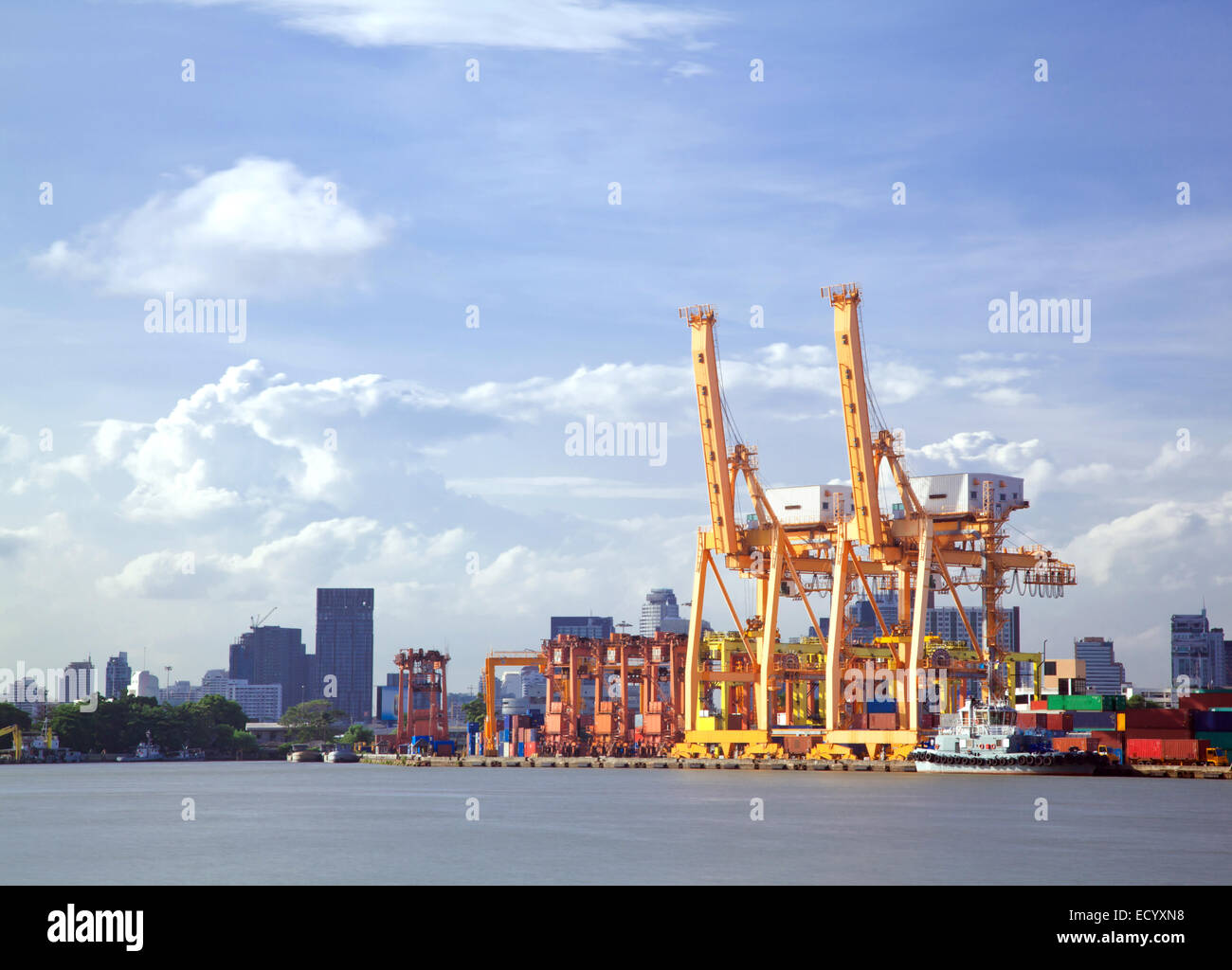 Container stacks and crane bridge in shipyard for cargo and Logistic ...