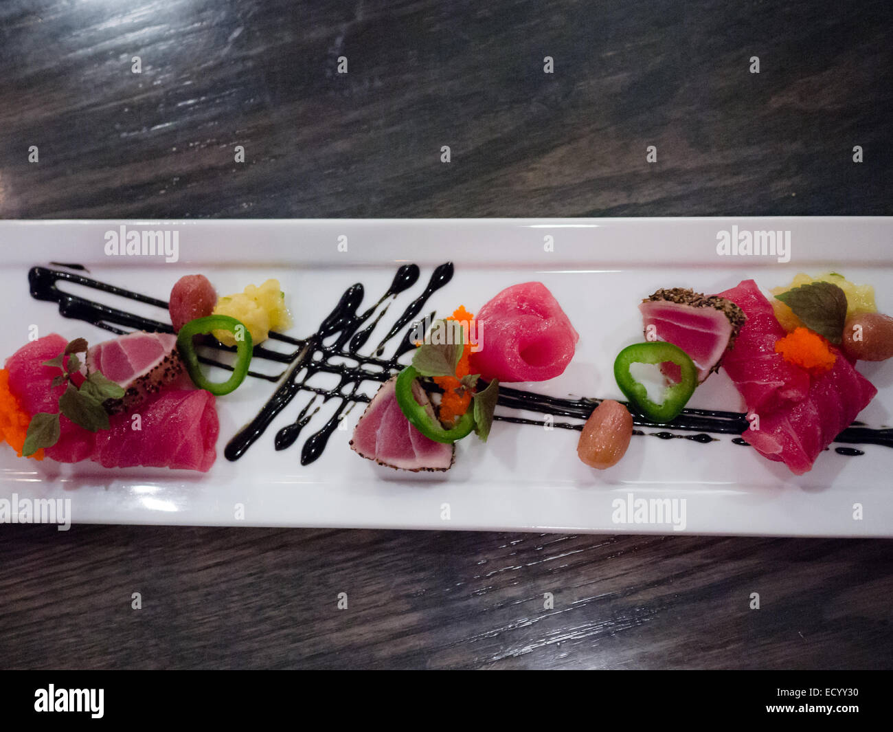 tuna sashimi appetizer inside seafood restaurant Stock Photo - Alamy
