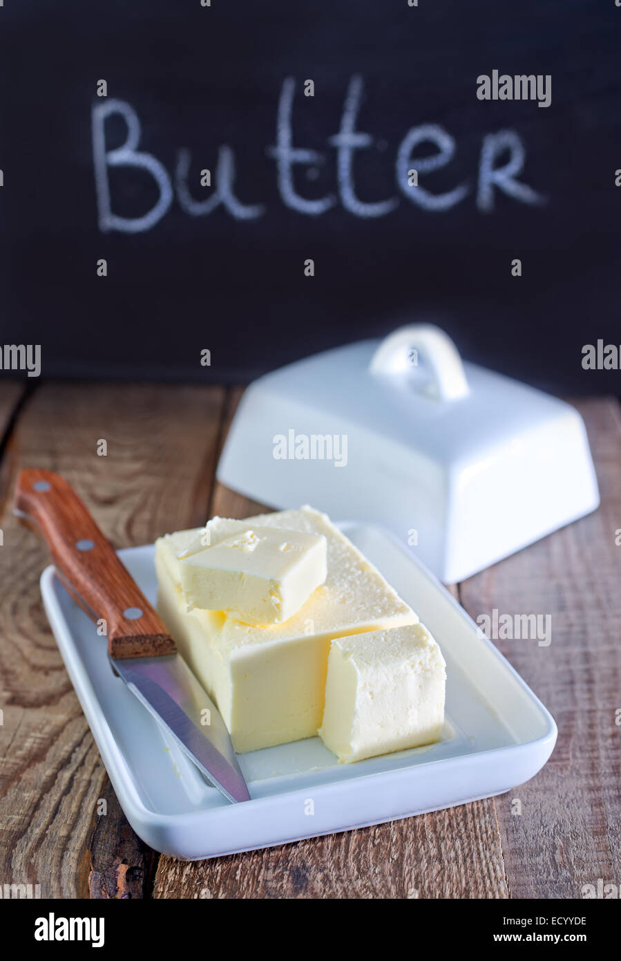 butter on white plate and on a table Stock Photo - Alamy