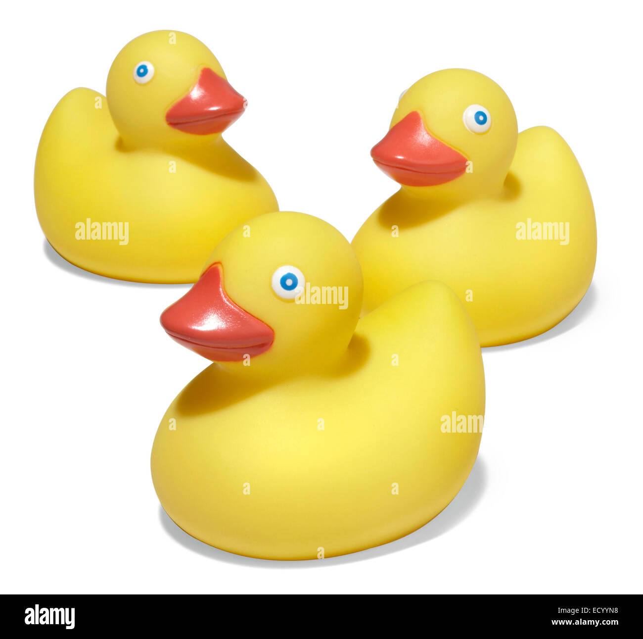 three rubber duckies on white Stock Photo - Alamy