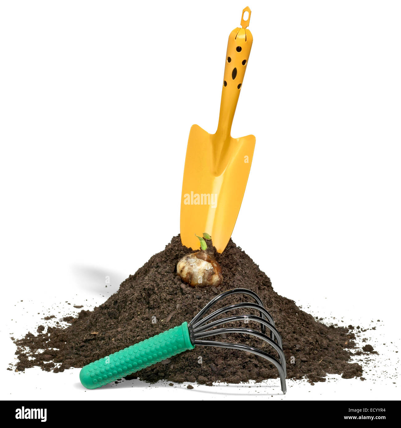 trowel in dirt with rake Stock Photo - Alamy