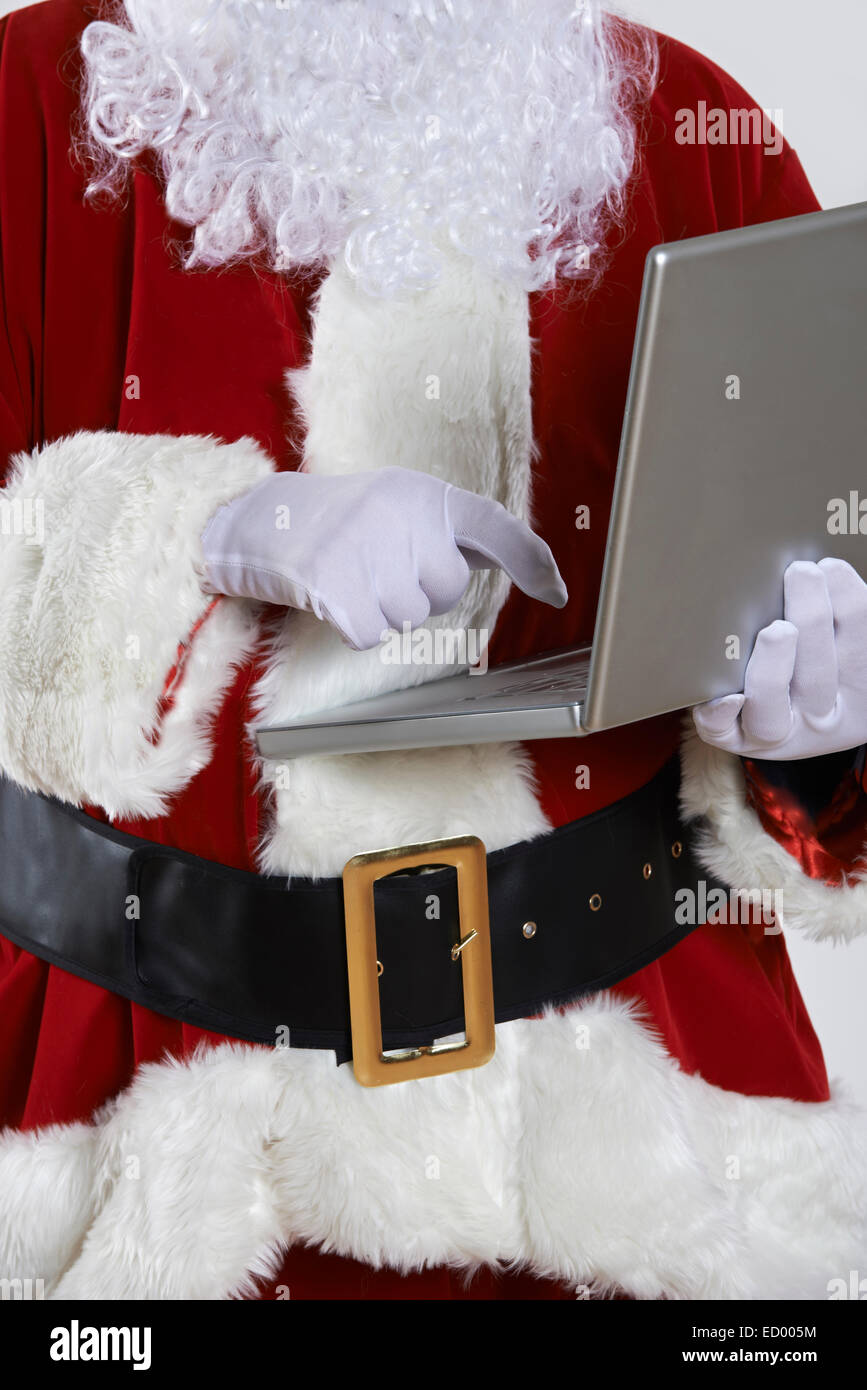 Santa Claus Using Laptop On White Background Stock Photo - Alamy