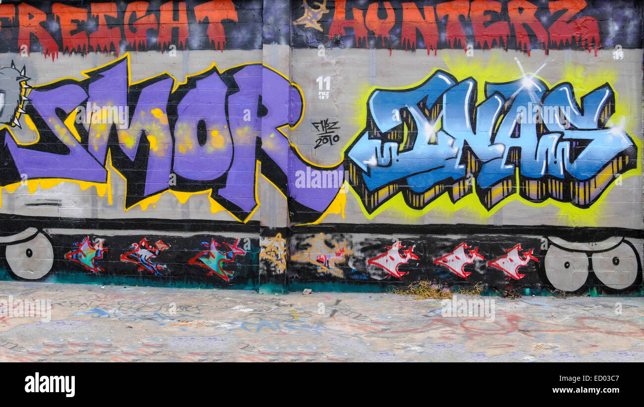Grafitti on a block wall Stock Photo - Alamy