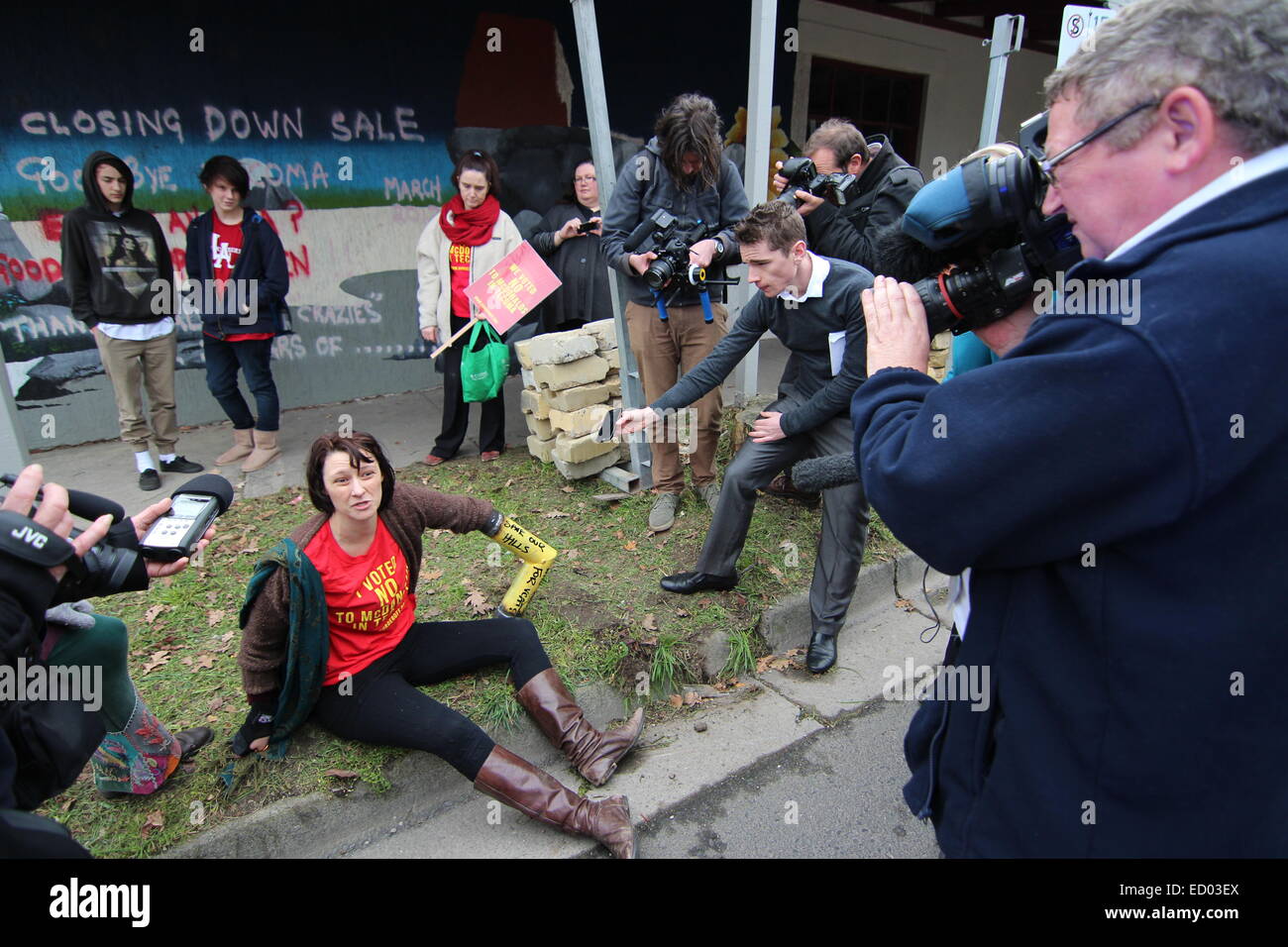 No McDonalds in Tecoma Protester with clamping device on arm, as she is ...
