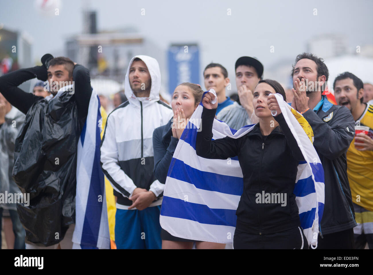 Fans watching the 2014 FIFA World Cup - Group D match, England v ...