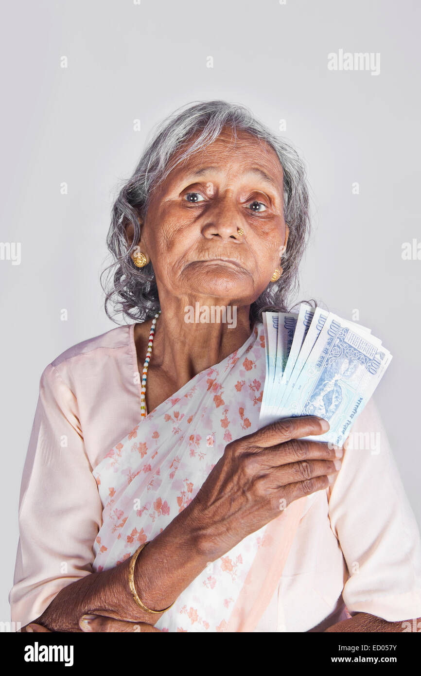 1 indian Old Senior Woman Saving money Stock Photo - Alamy