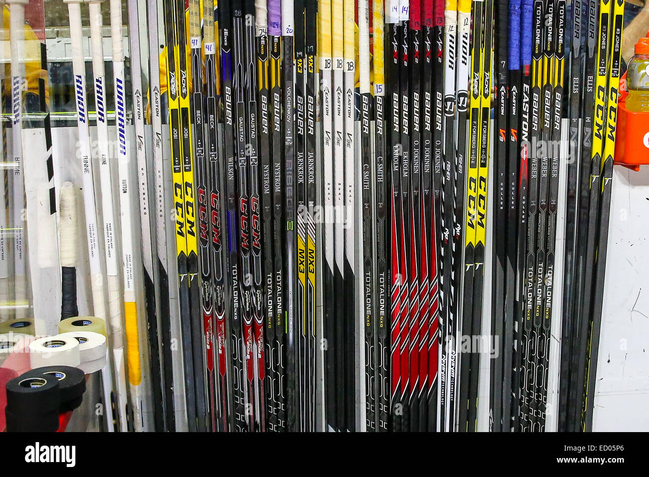 Nashville Predators hockey sticks on the bench during the NHL game ...