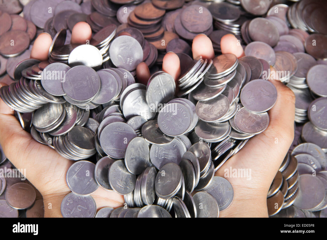 1 lady hand saving money part of Stock Photo - Alamy