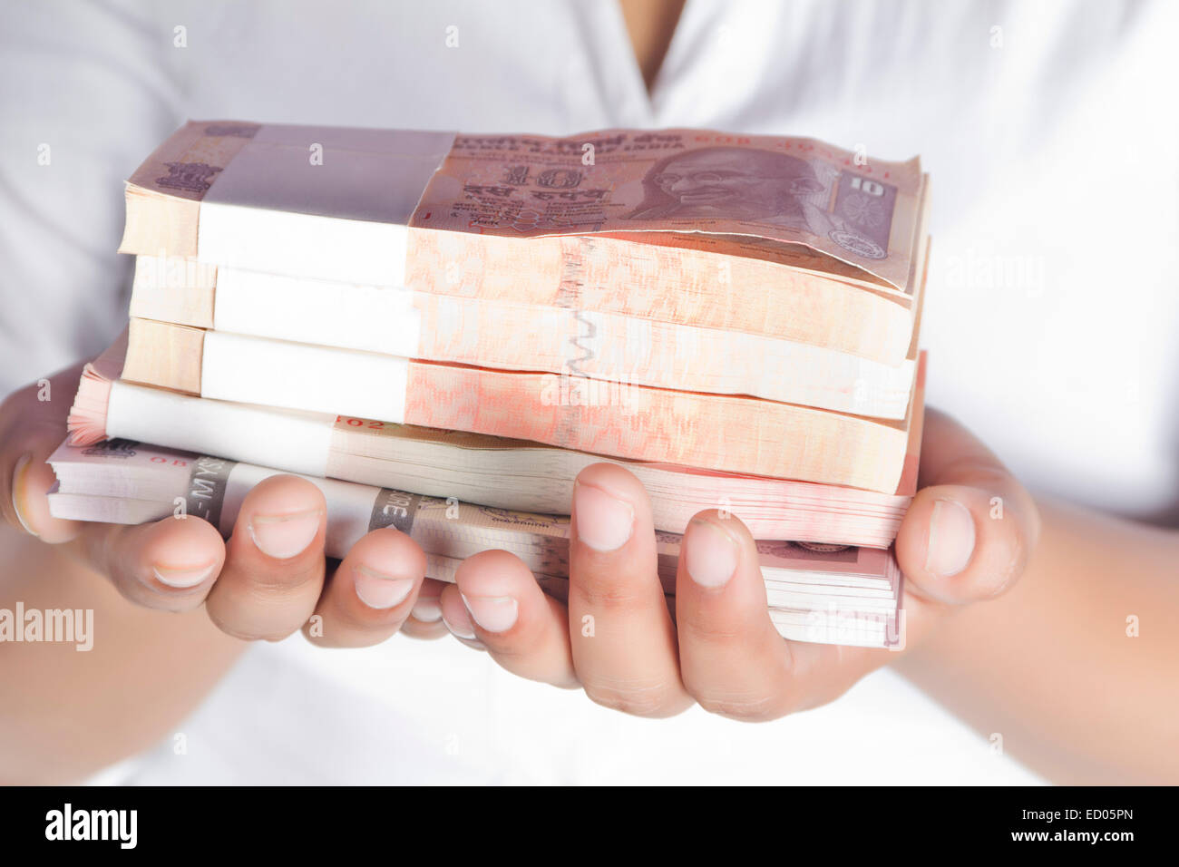 1 lady hand saving money part of Stock Photo - Alamy
