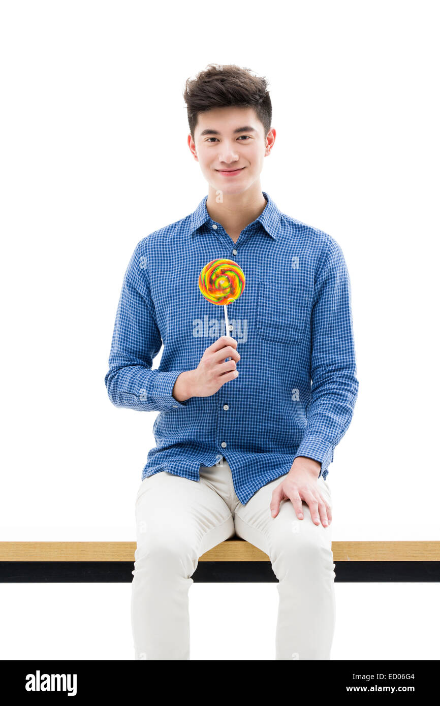 Man holding candy Cut Out Stock Images & Pictures - Alamy