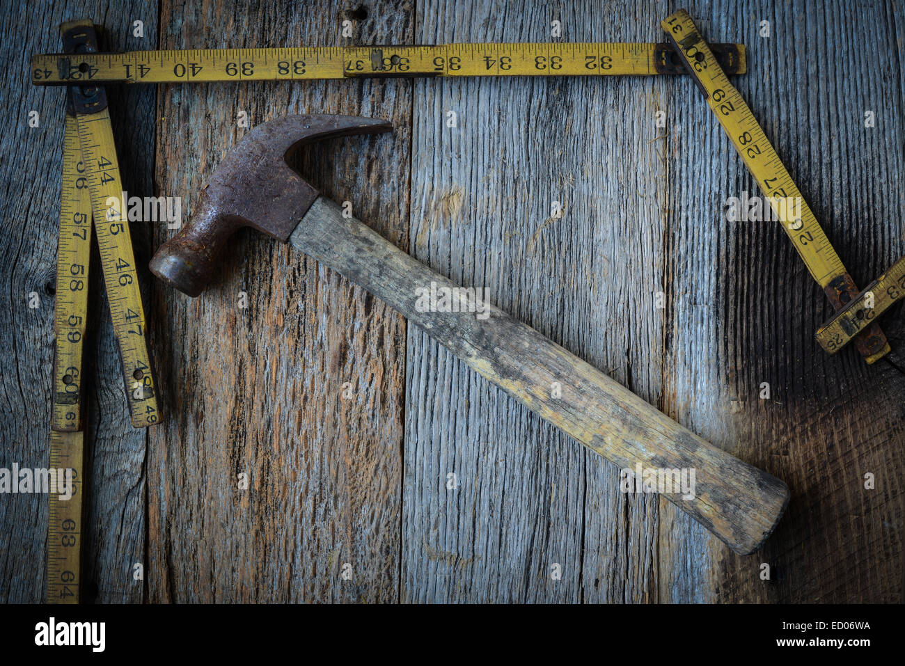 Tape measure and hammer on wood hi-res stock photography and images - Alamy