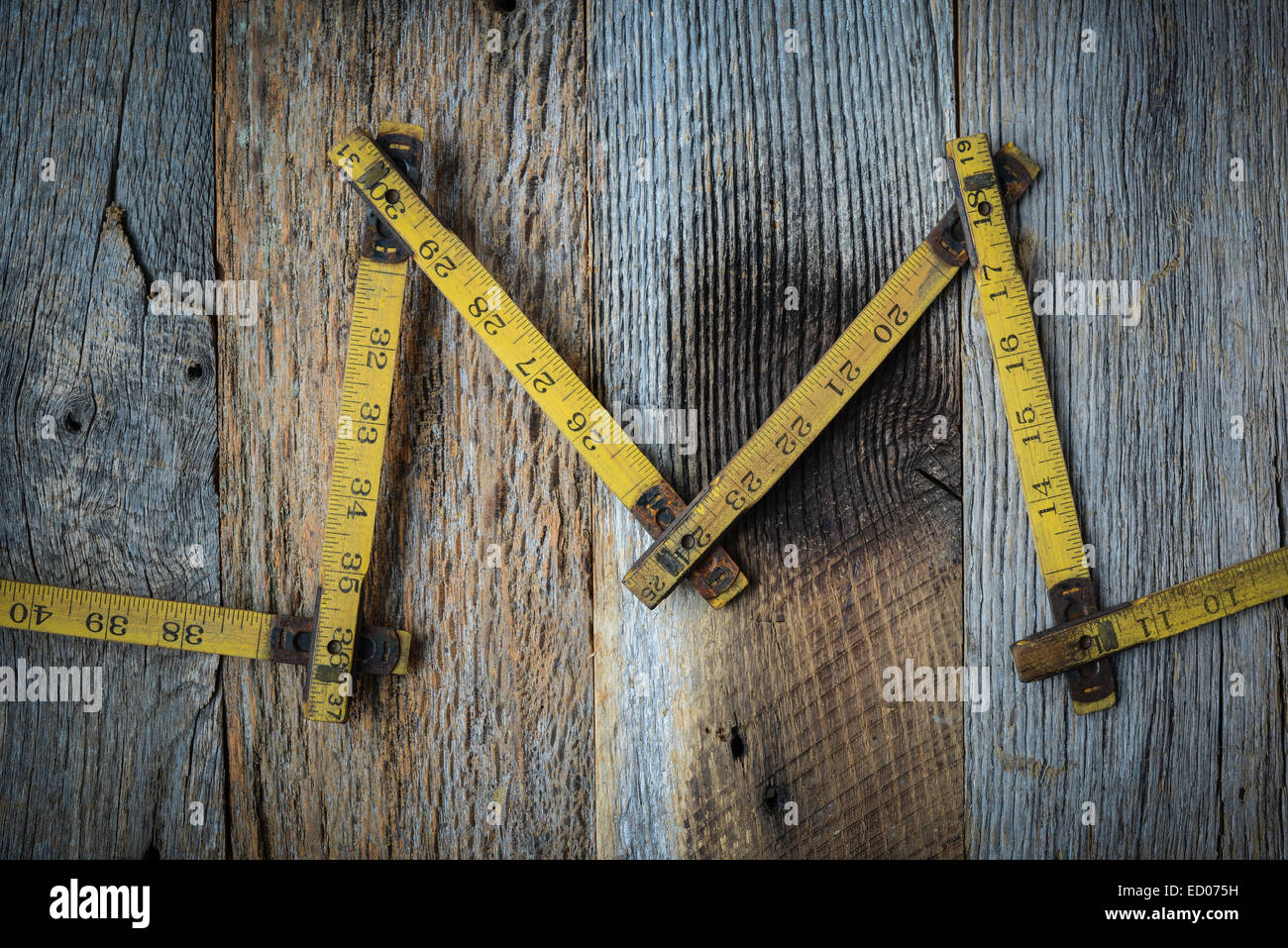 Old Tape Measure on Rustic Wood Background Stock Photo - Alamy