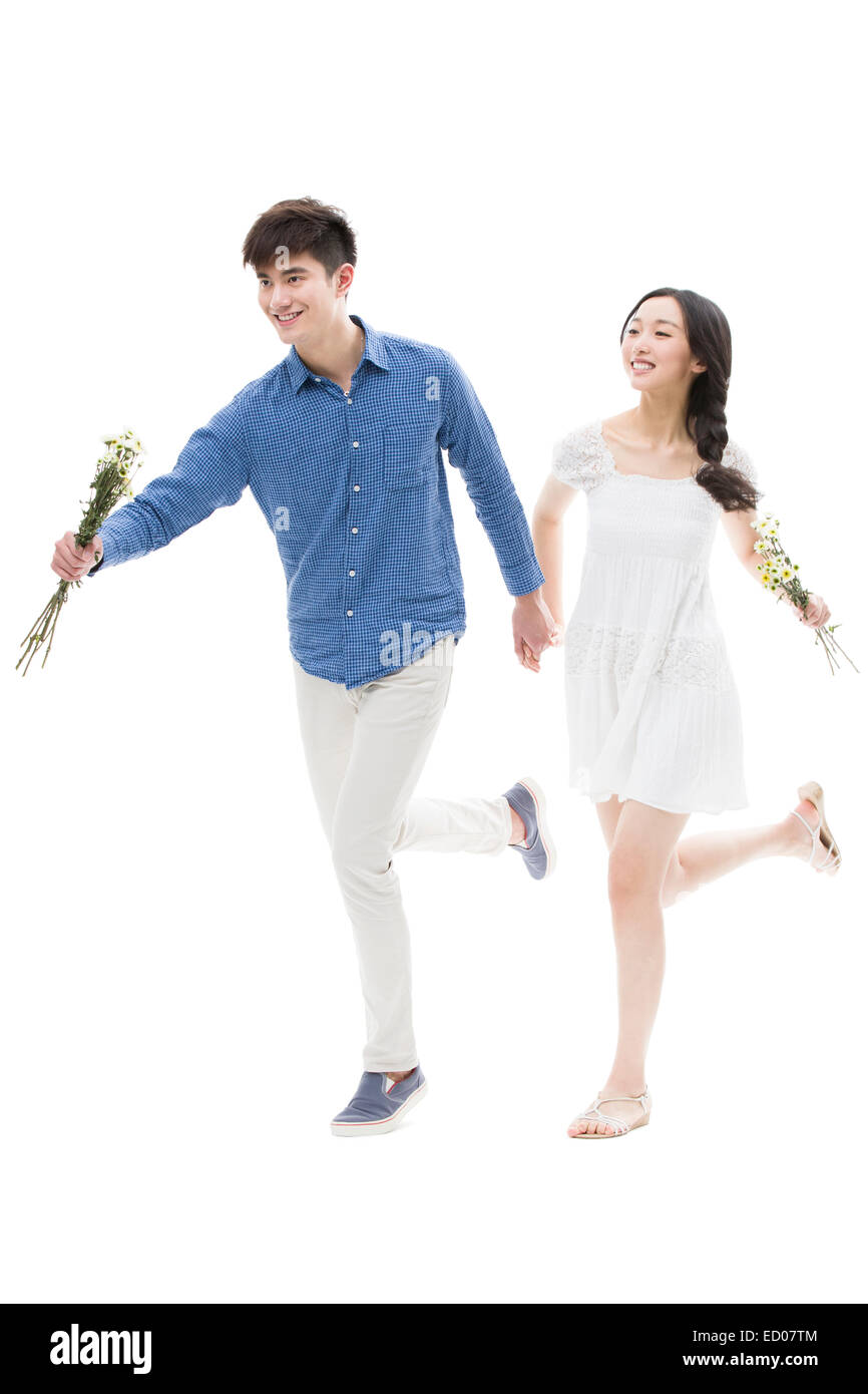 Women with flowers running hi-res stock photography and images - Alamy