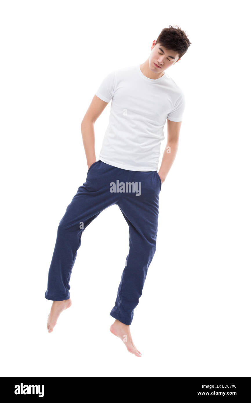 Young man sleeping in mid-air Stock Photo - Alamy