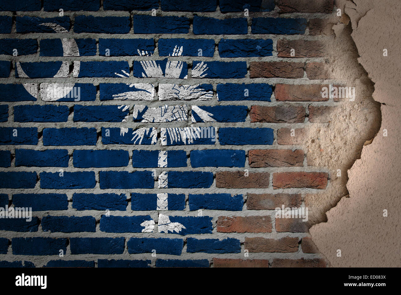 Dark brick wall texture with plaster - flag painted on wall - South ...