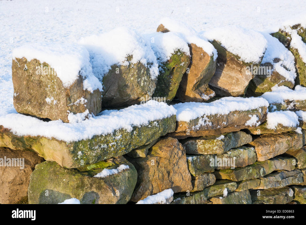 Drystone wall in the snow Stock Photo - Alamy