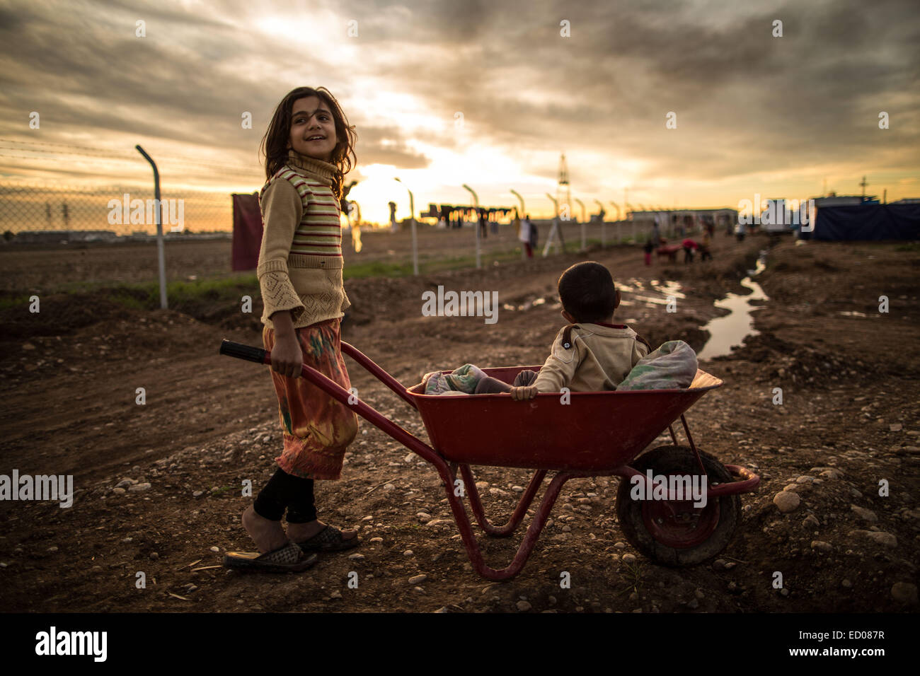 Beijing, Iraq's Kurdish autonomous region. 12th Dec, 2014. A girl plays ...