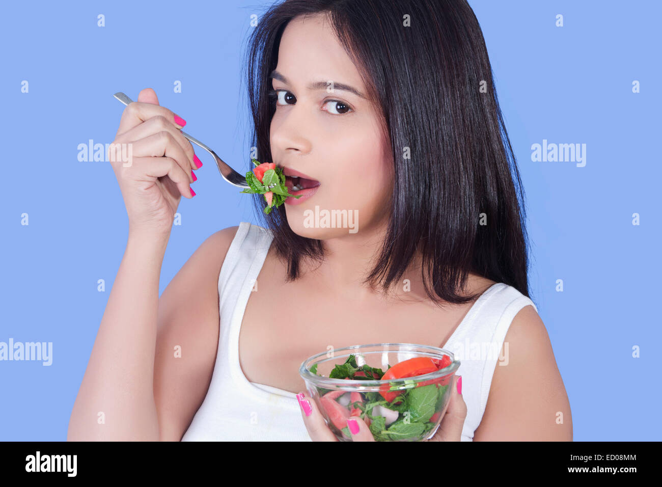 1 indian Beautiful lady eating Salad Dieting Stock Photo - Alamy