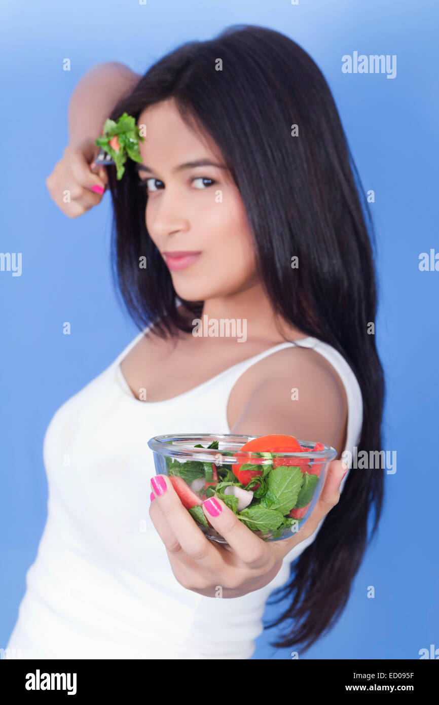 1 indian Beautiful lady eating Salad Dieting Stock Photo - Alamy