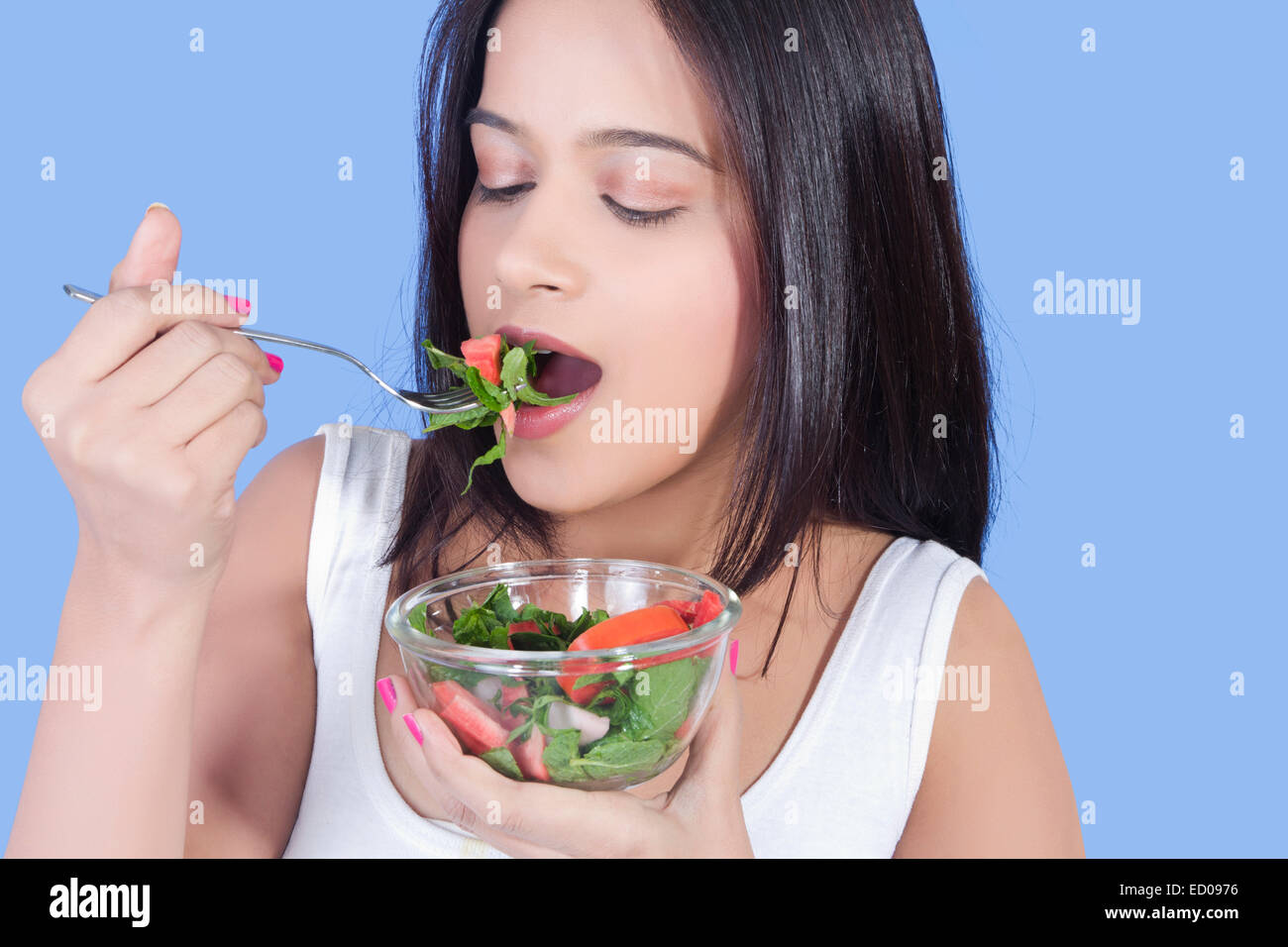 1 indian Beautiful lady eating Salad Dieting Stock Photo - Alamy