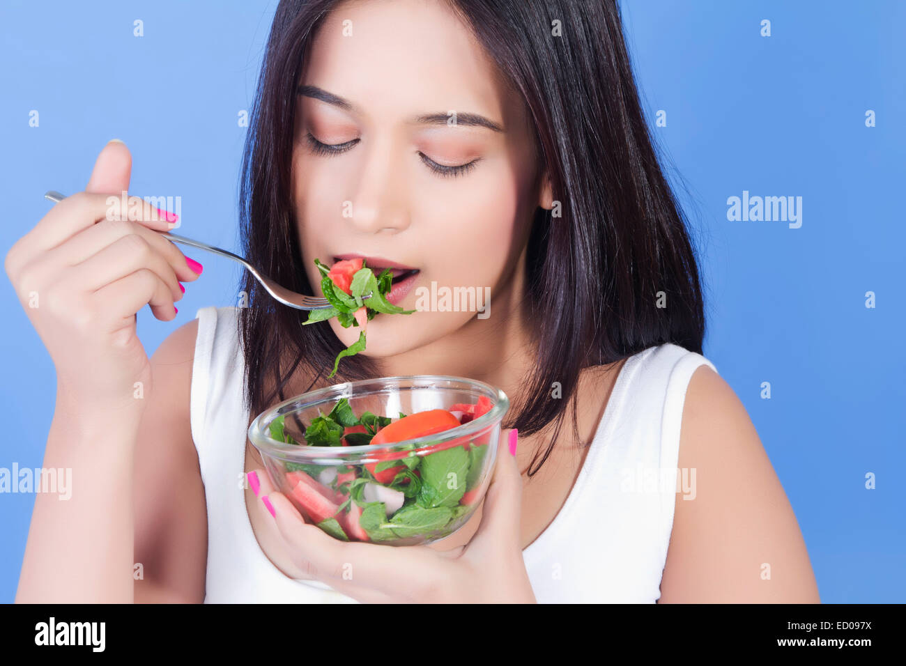 1 indian Beautiful lady eating Salad Dieting Stock Photo - Alamy