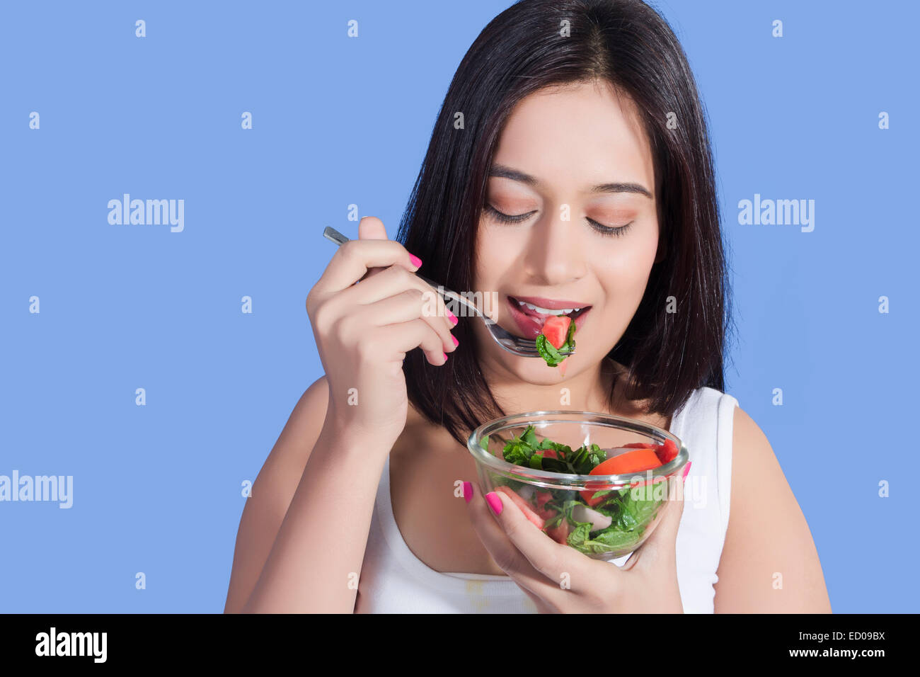 1 indian Beautiful lady eating Salad Dieting Stock Photo - Alamy