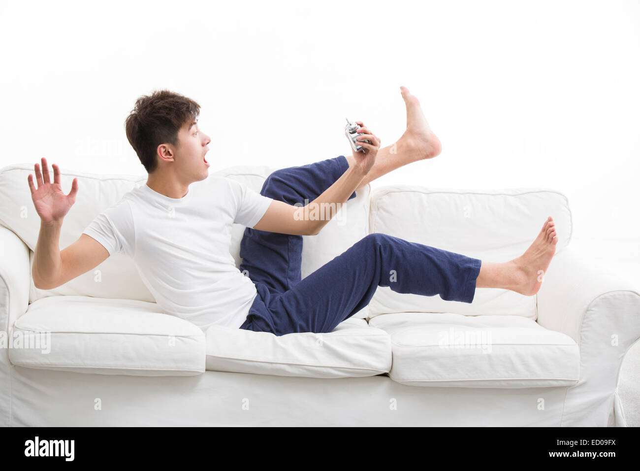 Young man waking up late Stock Photo - Alamy
