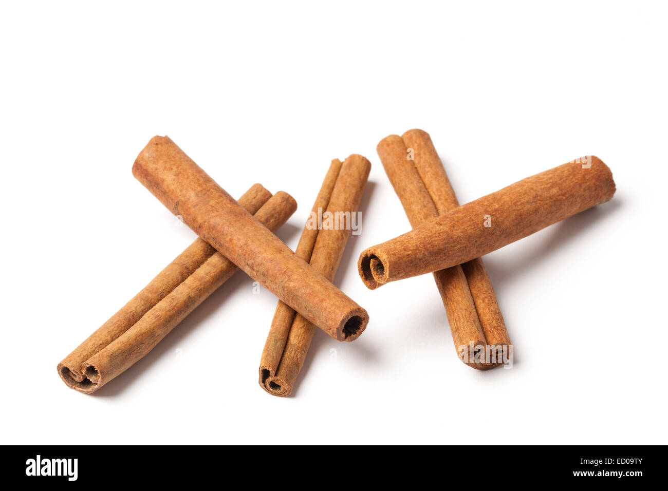 Several pieces cinnamon isolated on white background Stock Photo - Alamy