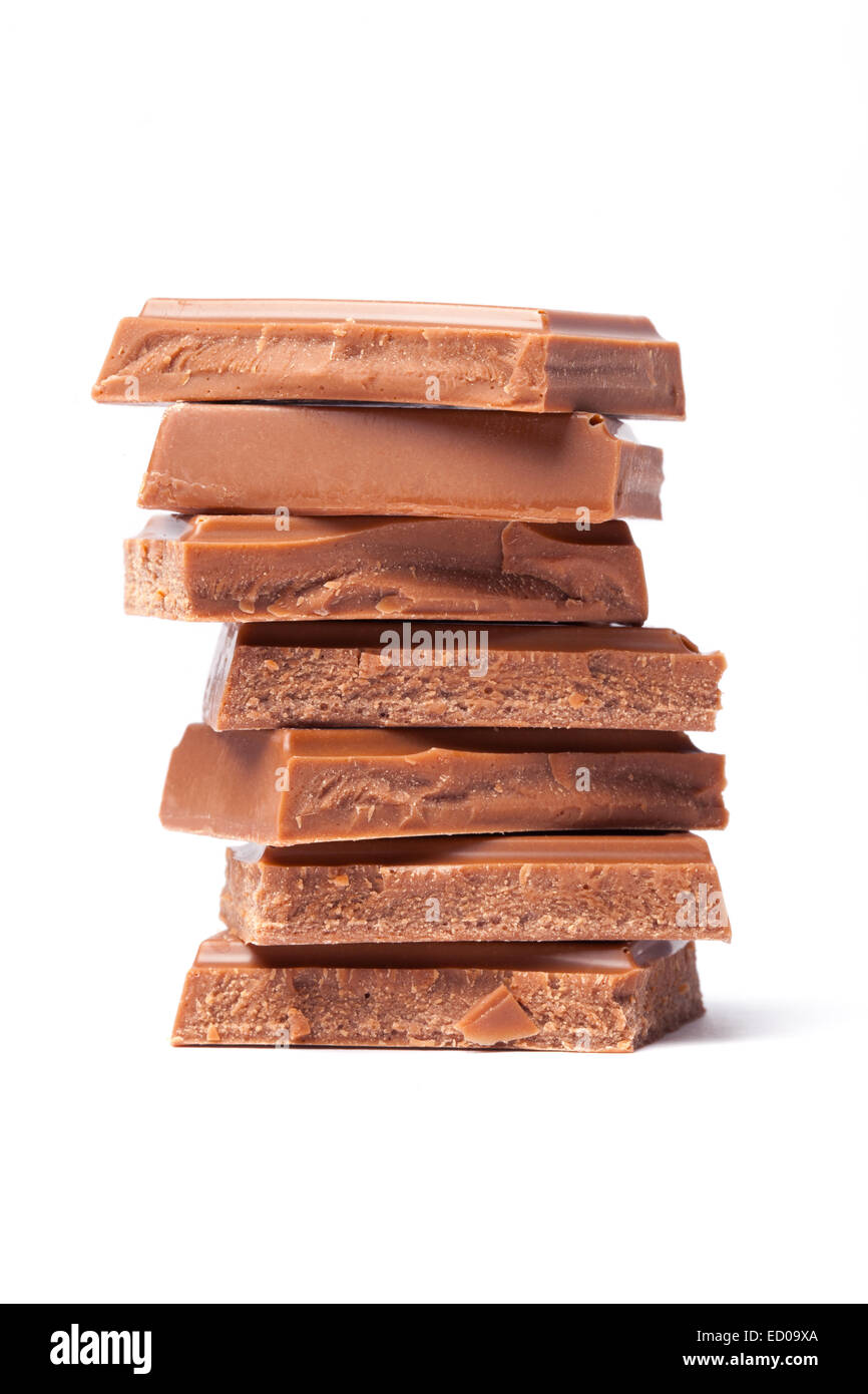 Stack of milk chocolate pieces hi-res stock photography and images - Alamy