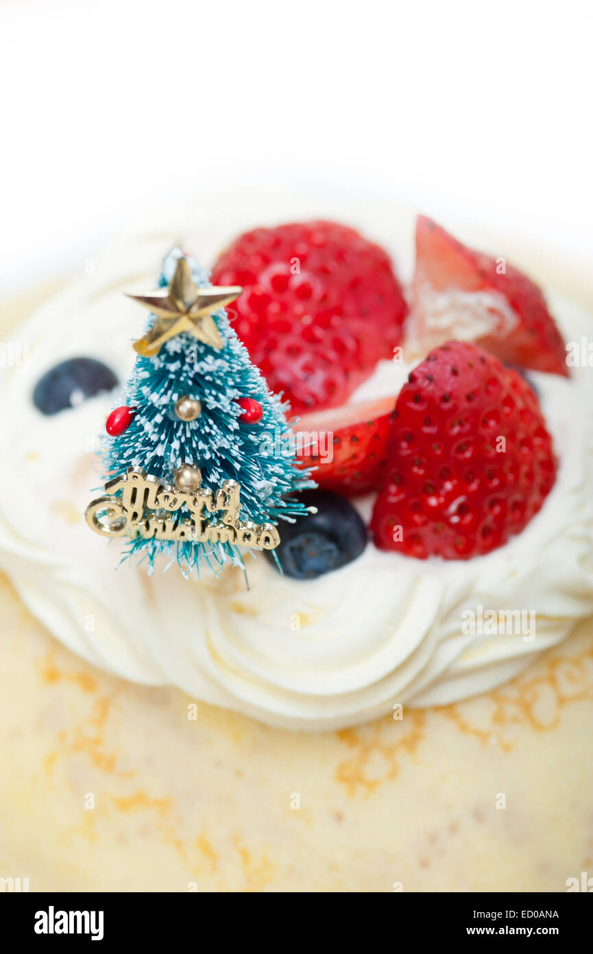 christmas tree on top of a pancake crepe mountain with whipped cream ...