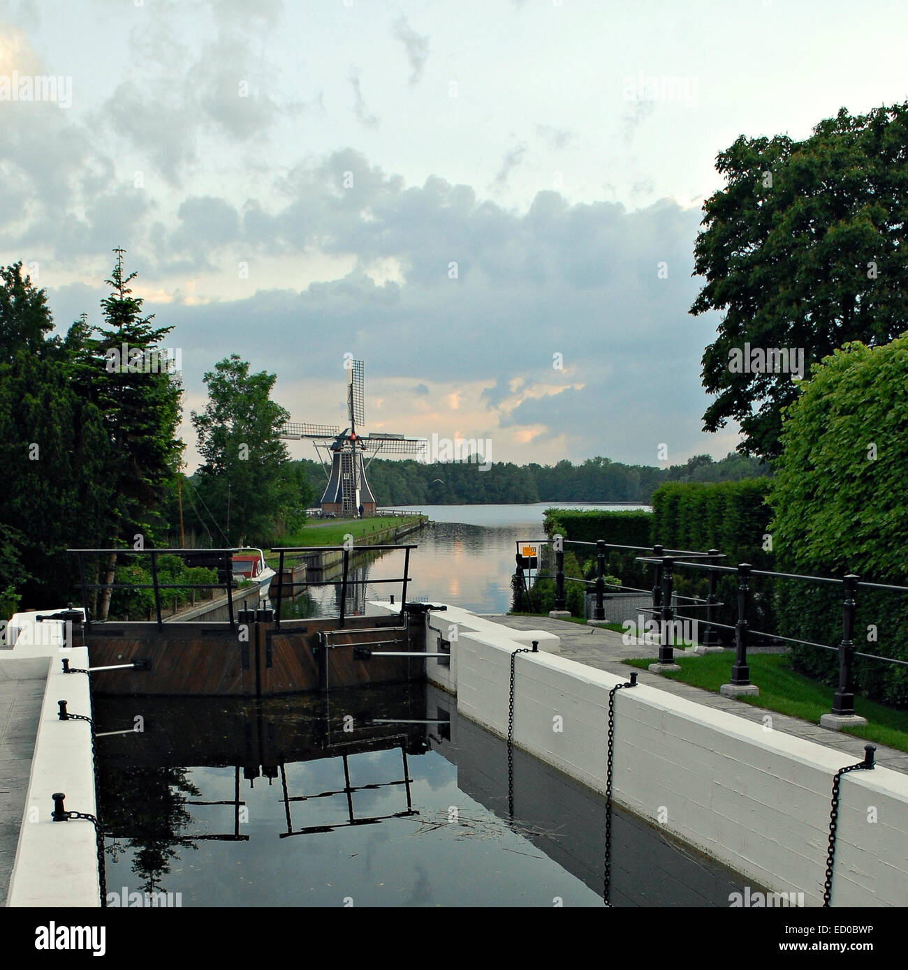 Canal lock by De Helper windmill at Lake Paterswolde, Haren ...