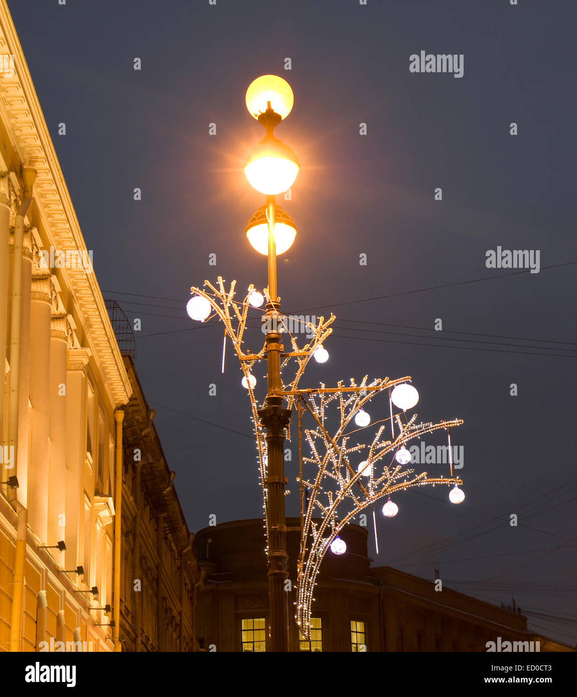 Electric decoration on street lamp to Christmas and New Year holidays ...