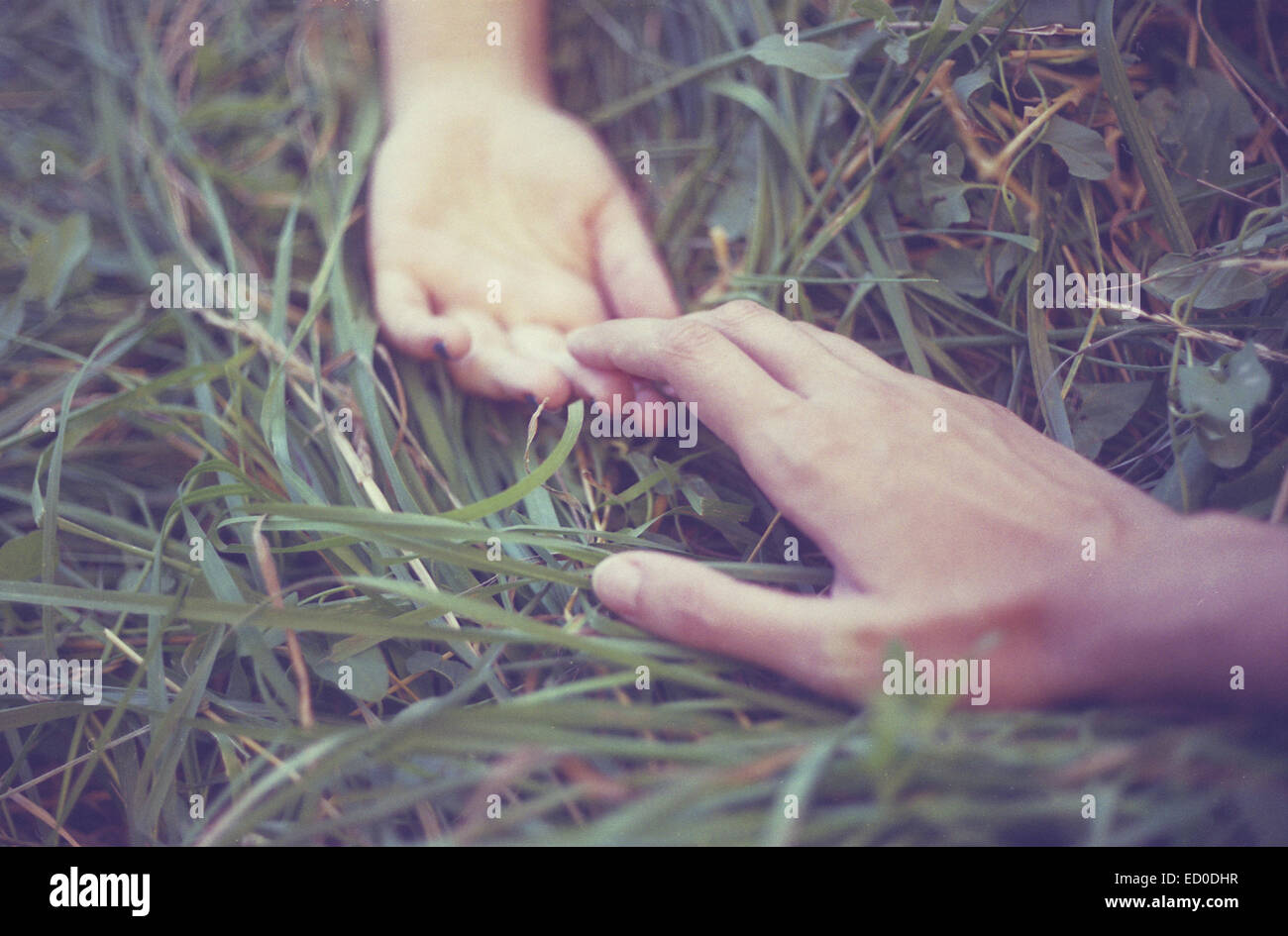 Hands reaching for each other hi-res stock photography and images - Alamy