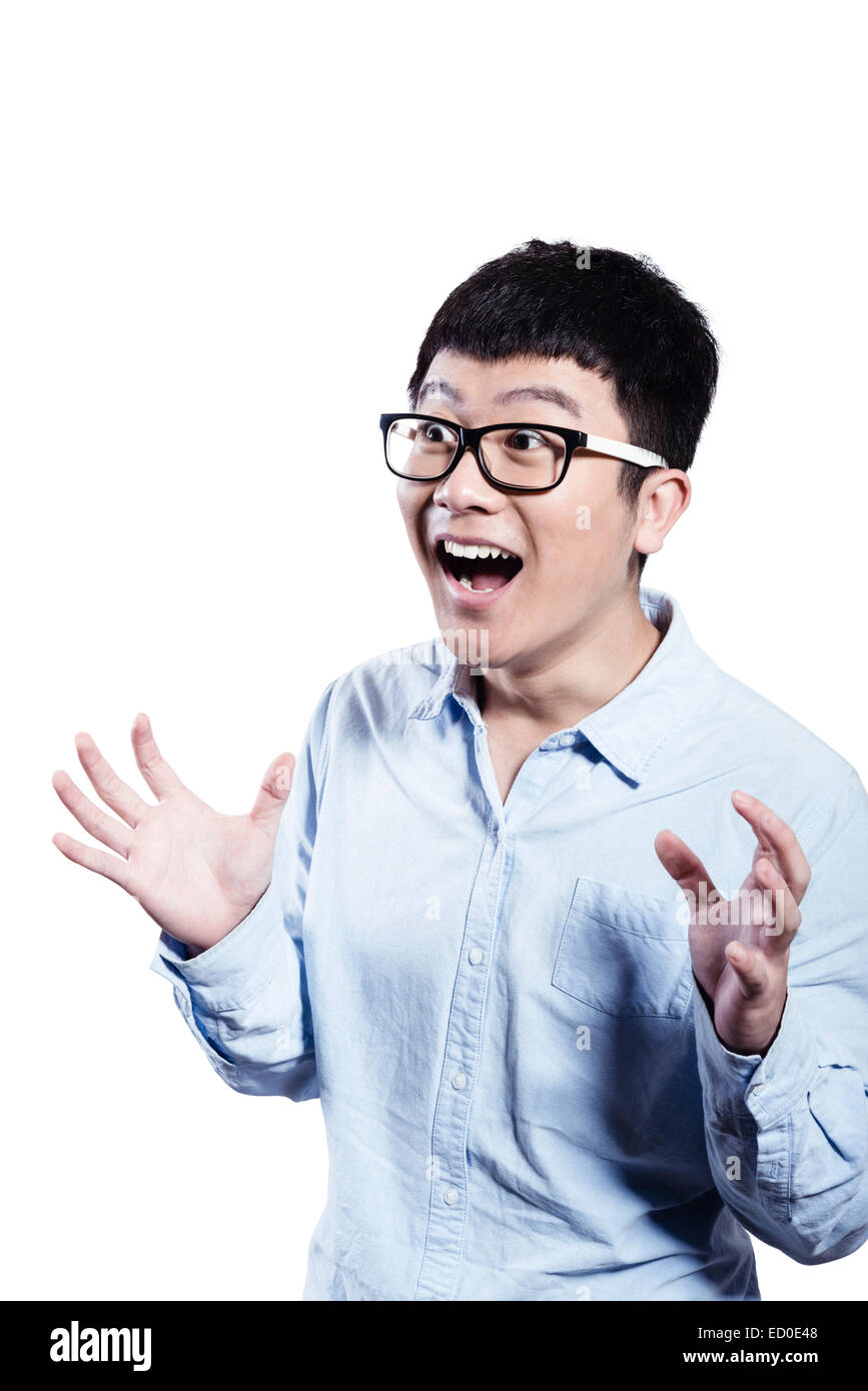 Portrait of surprised young man Stock Photo - Alamy