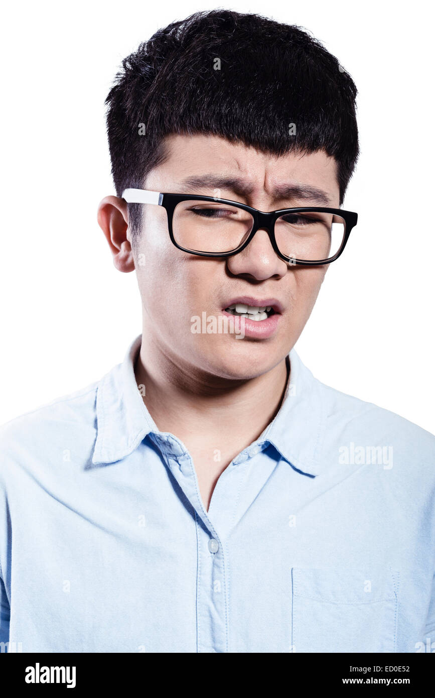 Young man disgusted Stock Photo - Alamy