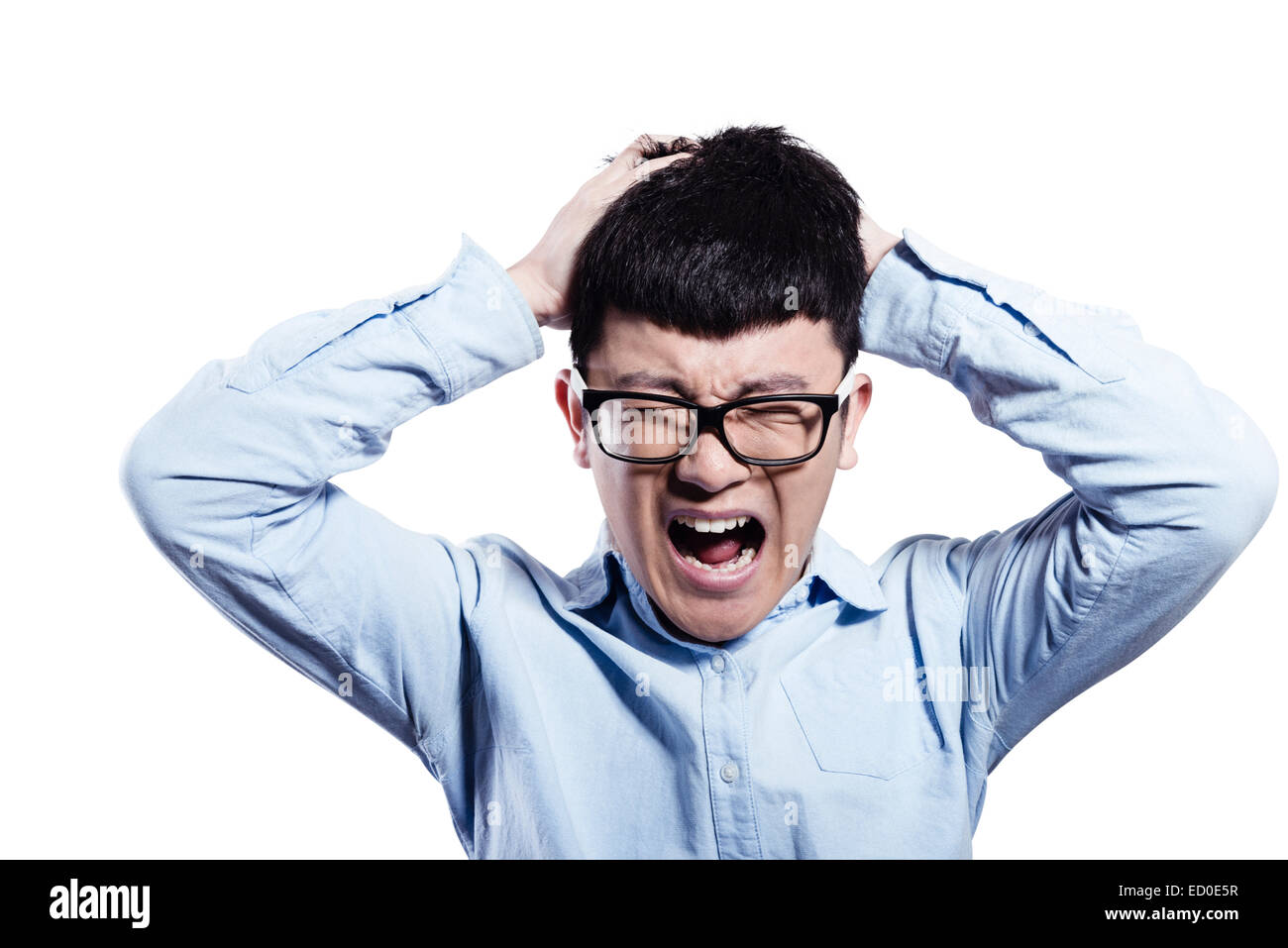 Portrait of angry young man Stock Photo - Alamy