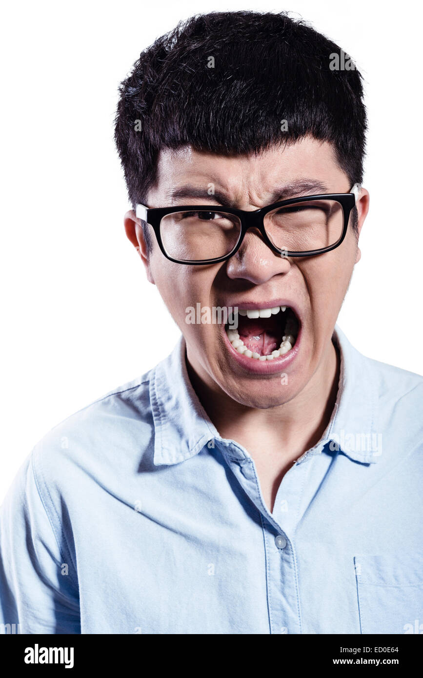 Portrait of angry young man Stock Photo - Alamy