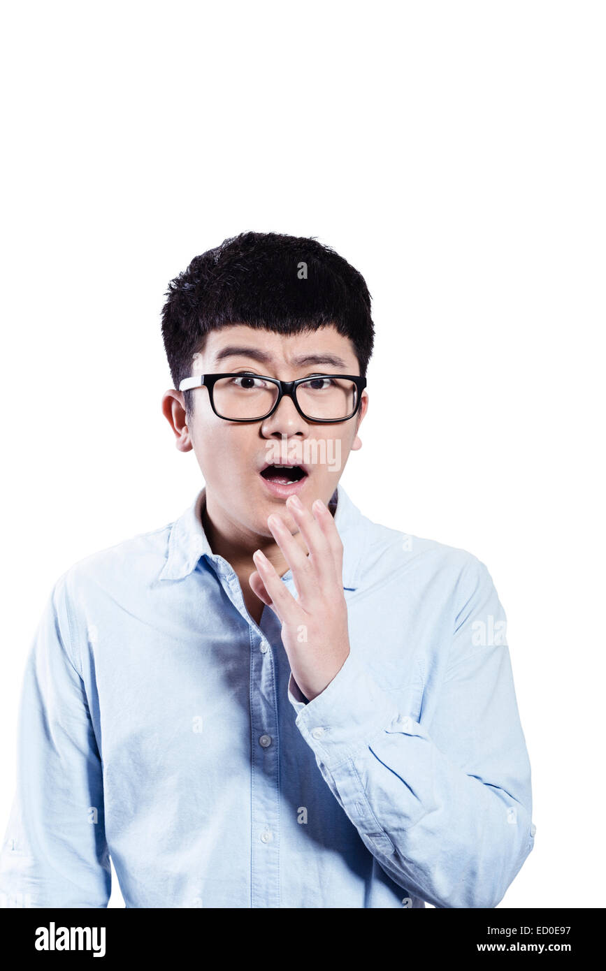 Young man in shock Stock Photo - Alamy