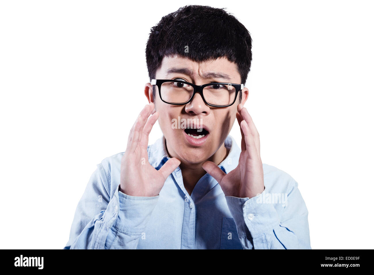 Young man in shock Stock Photo - Alamy