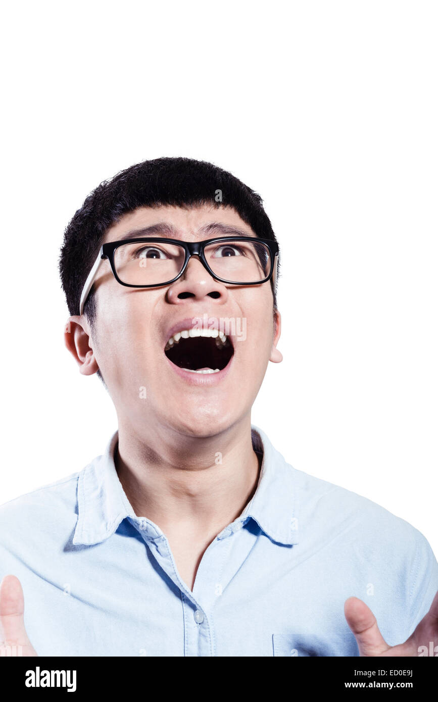 Young man screaming Stock Photo - Alamy