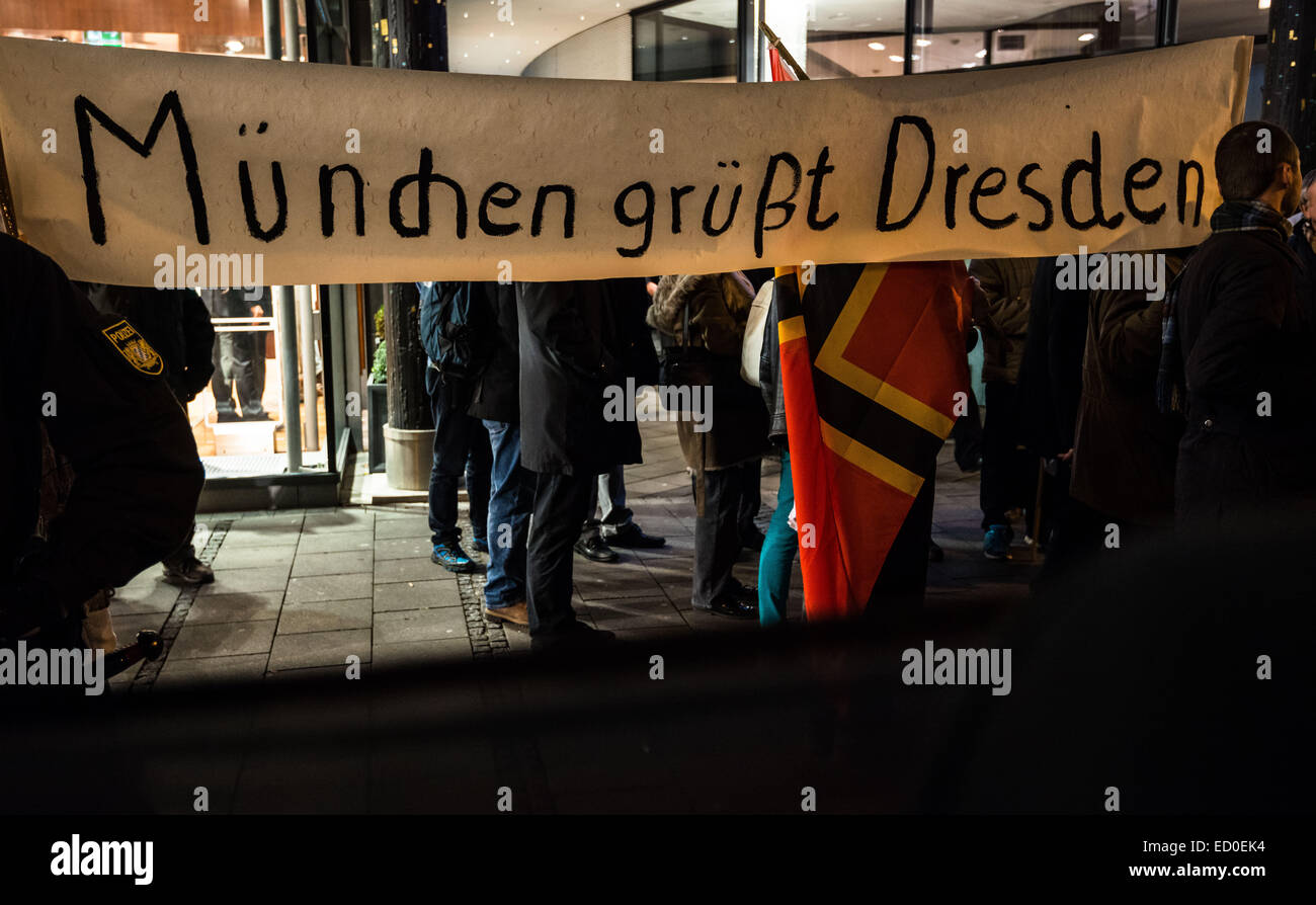Munich, Germany. 22nd Dec, 2014. Sympathizers of the 'Pegida' movement ...