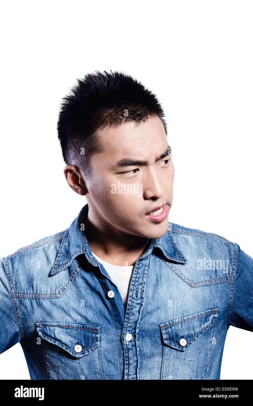 Portrait of angry young man Stock Photo - Alamy