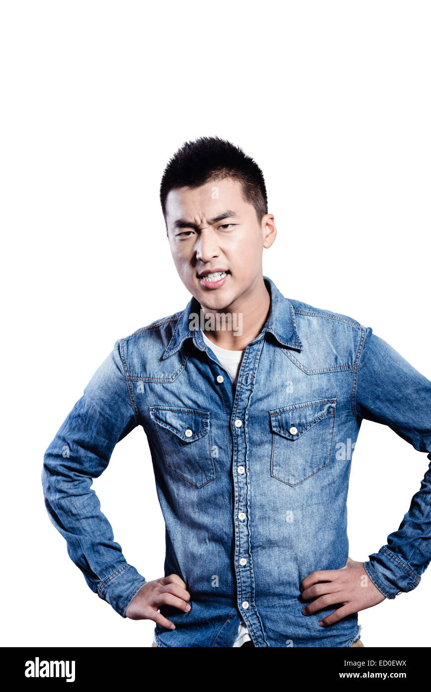 Portrait of angry young man Stock Photo - Alamy