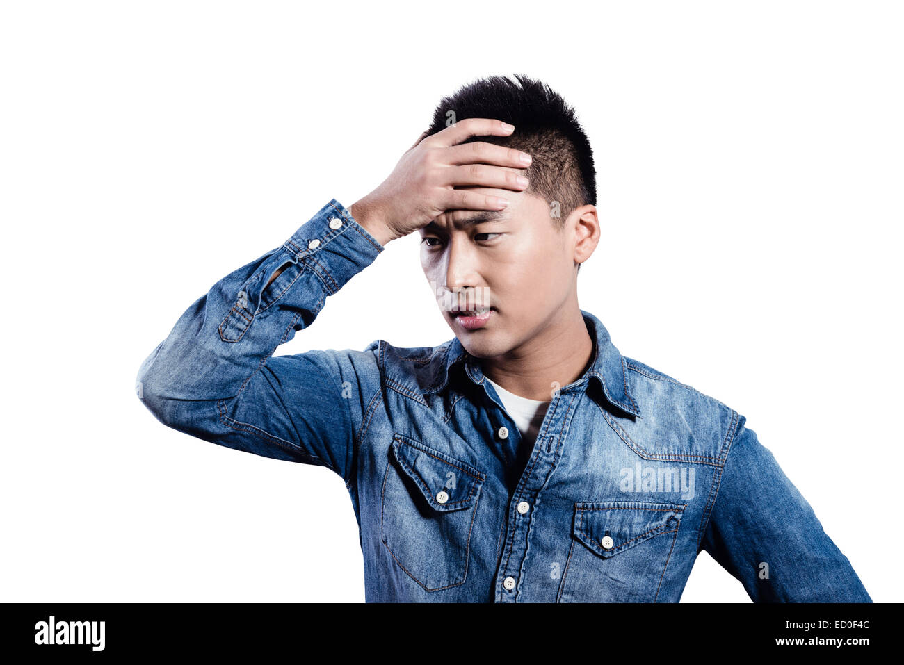 Portrait of suspicious young man Stock Photo - Alamy