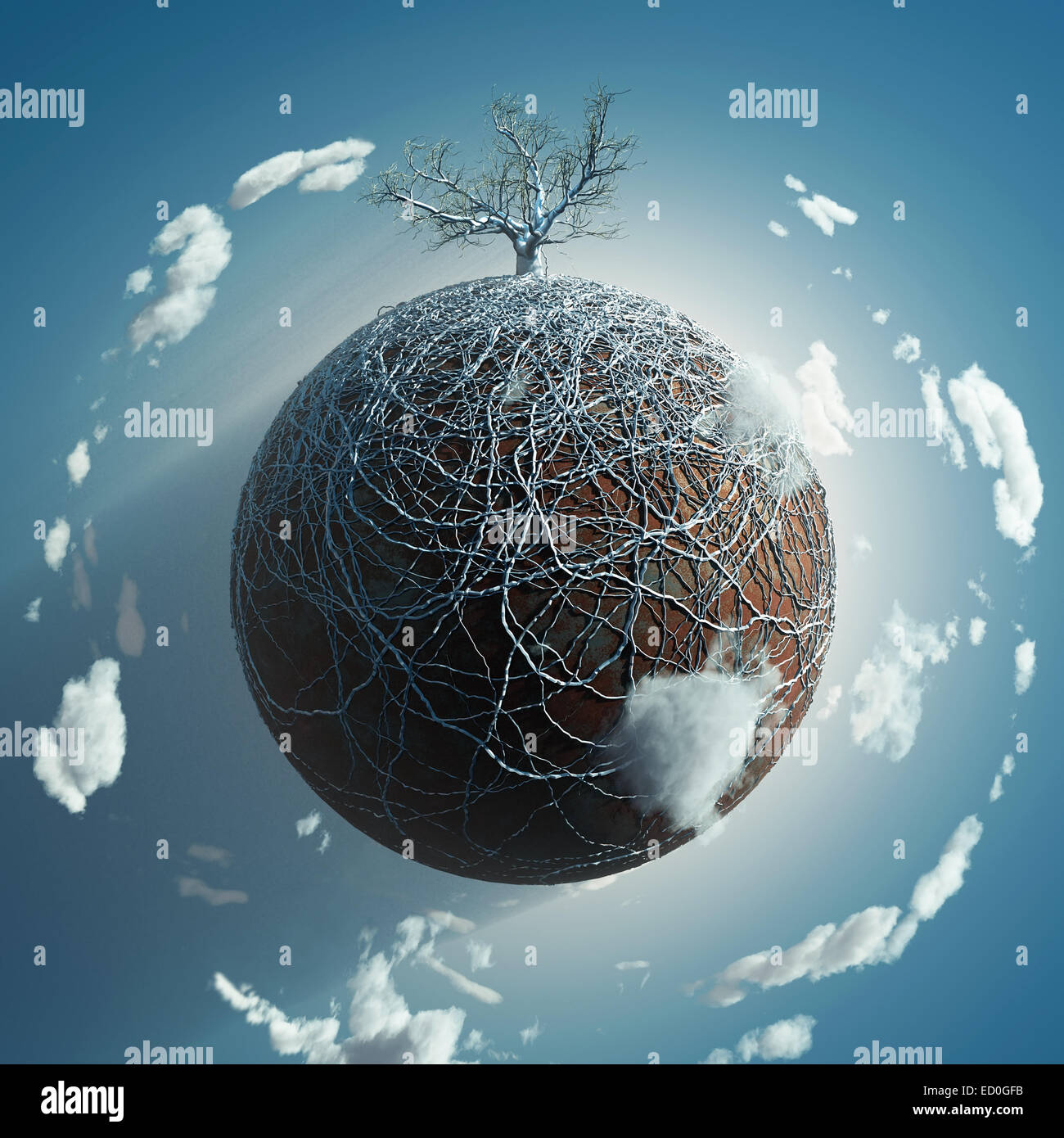 bare tree on small planet Stock Photo - Alamy