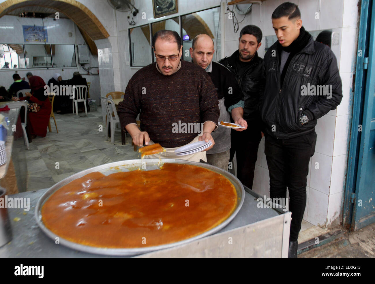 Nablus, West Bank, Palestinian Territory. 23rd Dec, 2014. A Palestinian ...