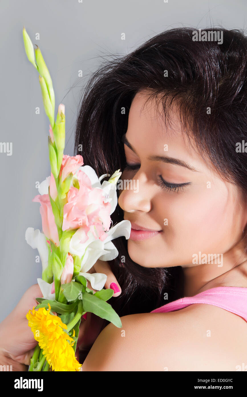 Indian girl holding flower hi-res stock photography and images - Alamy